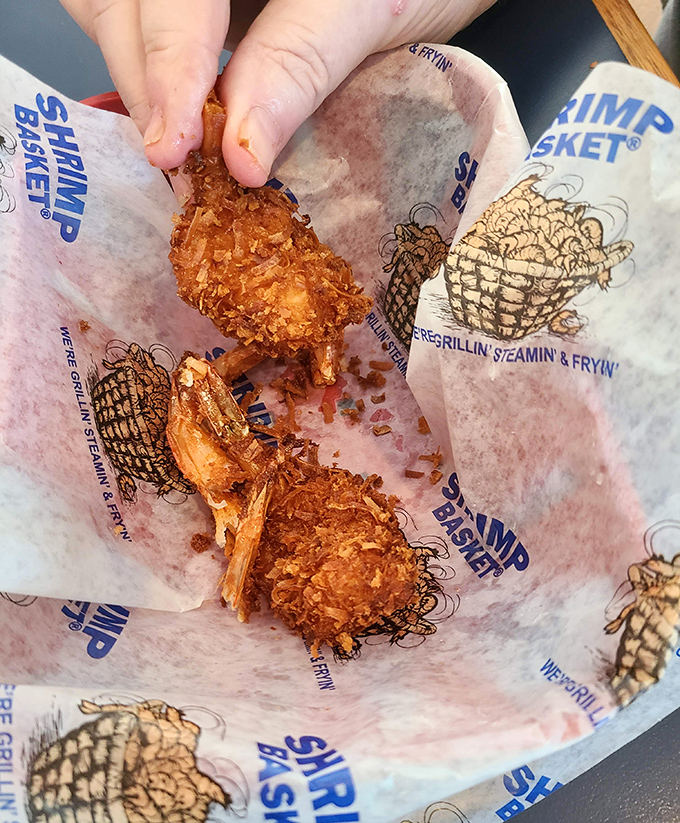 These coconut shrimp aren't just fried, they're transformed &ndash; wearing a golden armor of crispy coconut that shatters with each blissful bite.