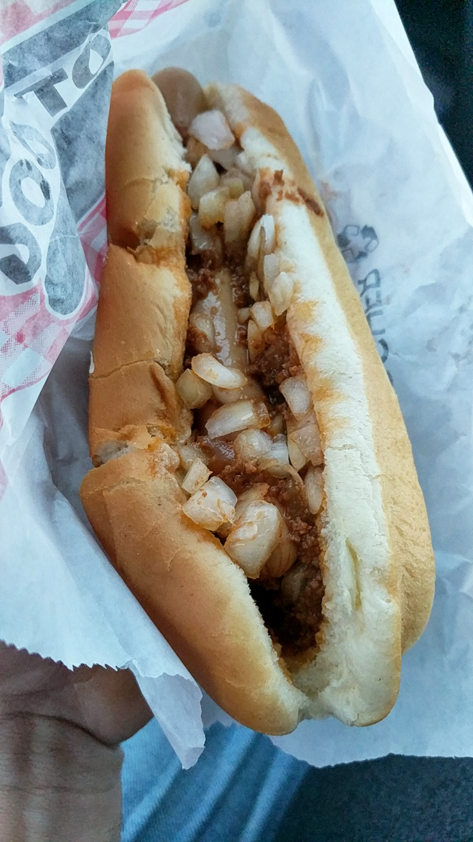 This isn't just a Coney dog&mdash;it's edible nostalgia. The perfect ratio of meat sauce to diced onions creates a symphony in a bun.