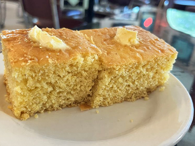 Cornbread so moist it barely needs butter, yet they add it anyway because some traditions are too delicious to question.