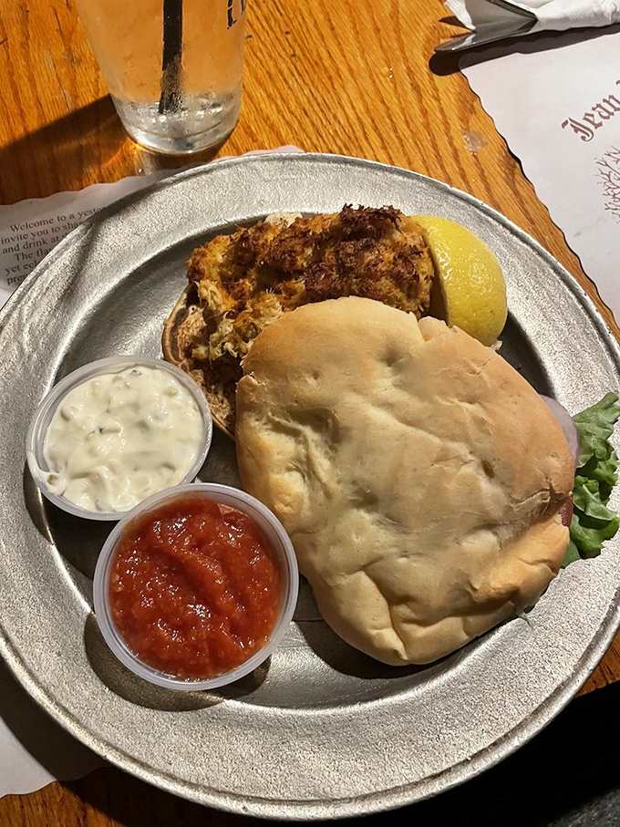 This crab cake sandwich isn't playing games. Packed with real crab meat, it's the kind of honest food that makes fast food chains weep with inadequacy.