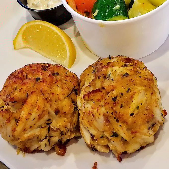 Maryland crab cakes done right&mdash;mostly crab, barely bound, golden-brown perfection that would make locals nod in approval.