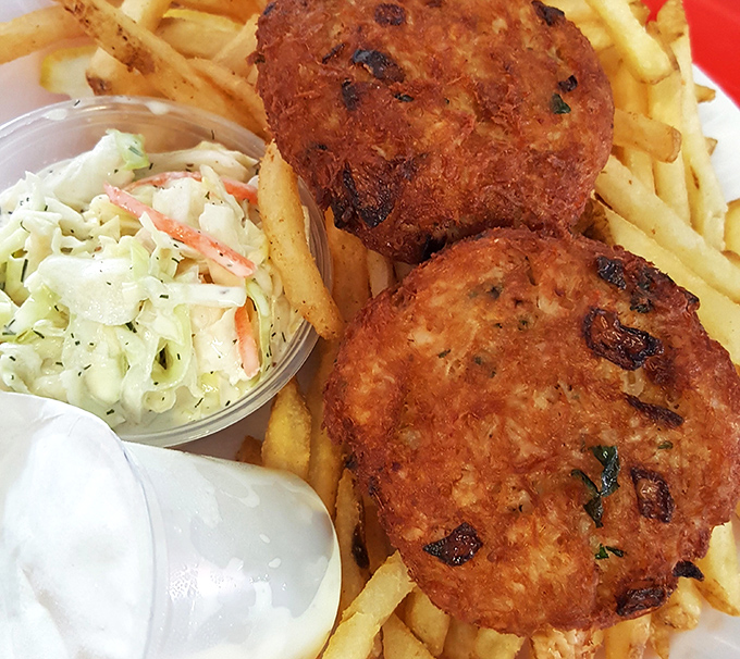 Golden-brown crab cakes that would make Maryland jealous. Crispy exterior, tender interior &ndash; the seafood equivalent of finding buried treasure.