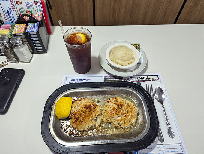 The star attraction: golden-brown crab cakes that make you question how a Pennsylvania diner mastered coastal cuisine so brilliantly.
