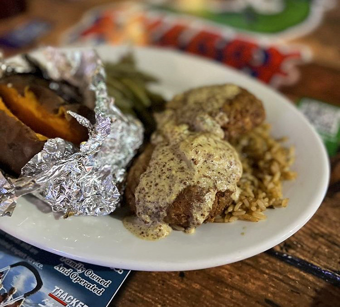 A plate that answers the eternal question: "What if crab cakes, but smaller and more addictive?" The dipping sauce seals the deal.