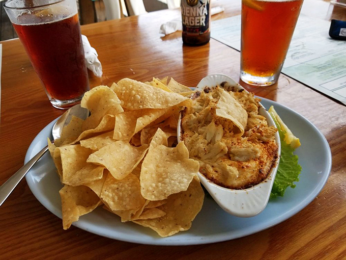 Crab dip and tortilla chips: the beach vacation equivalent of finding an extra $20 in your swimsuit pocket—unexpected and absolutely delightful.