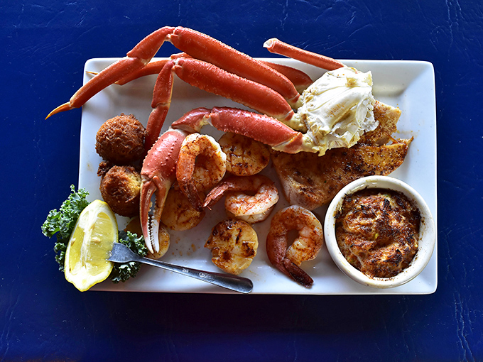 The seafood platter that launched a thousand return trips. Those crab legs aren't just food—they're an event requiring both hands and zero dignity.