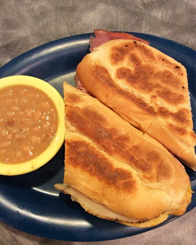 A Cuban sandwich and beans that could make Hemingway put down his pen and pick up a fork. Simple perfection between bread. 