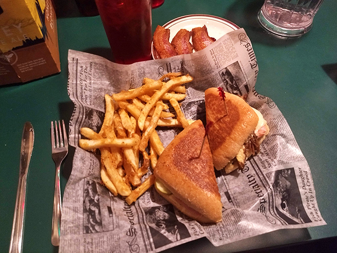 Newspaper as serving paper? That's how you know you're about to experience a sandwich that makes headlines in your personal food diary.