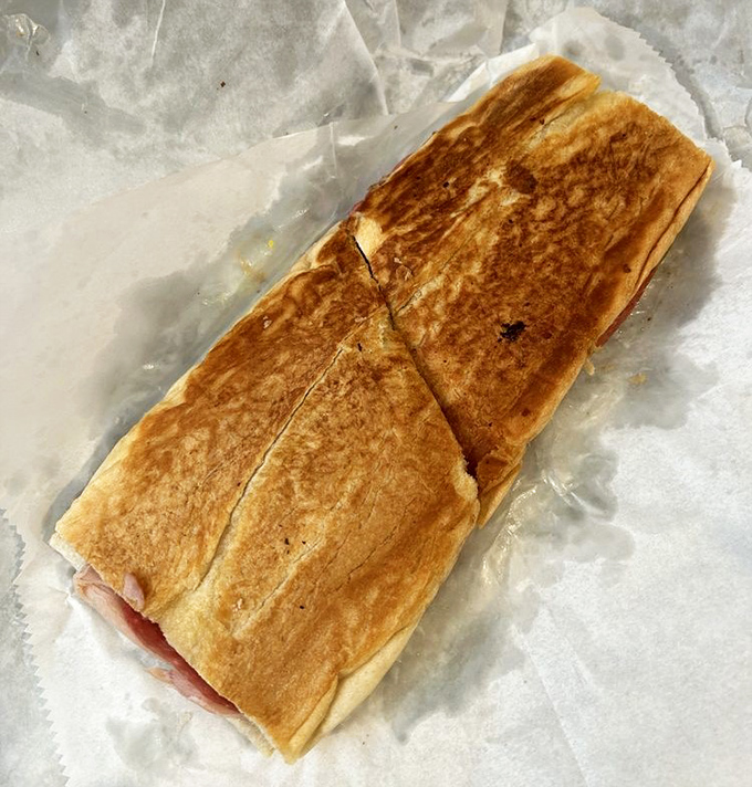 The Cuban sandwich, pressed to golden perfection, provides conclusive evidence that Florida and Cuba created sandwich magic together.
