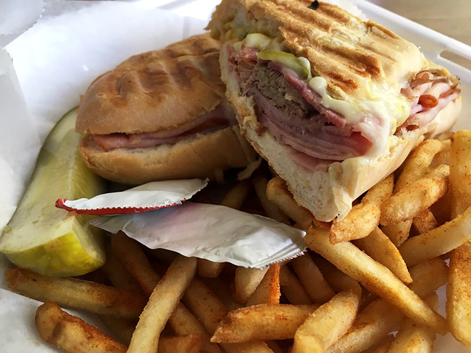 The Cuban sandwich arrives like a pressed postcard from heaven&mdash;layers of ham, pork, and cheese creating the kind of harmony that would make the Rat Pack jealous.