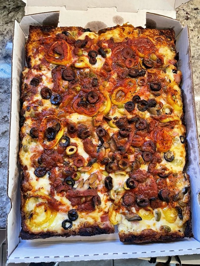 Behold the holy grail of Detroit pizza&mdash;crispy corners, caramelized cheese edges, and toppings that know their purpose in life.