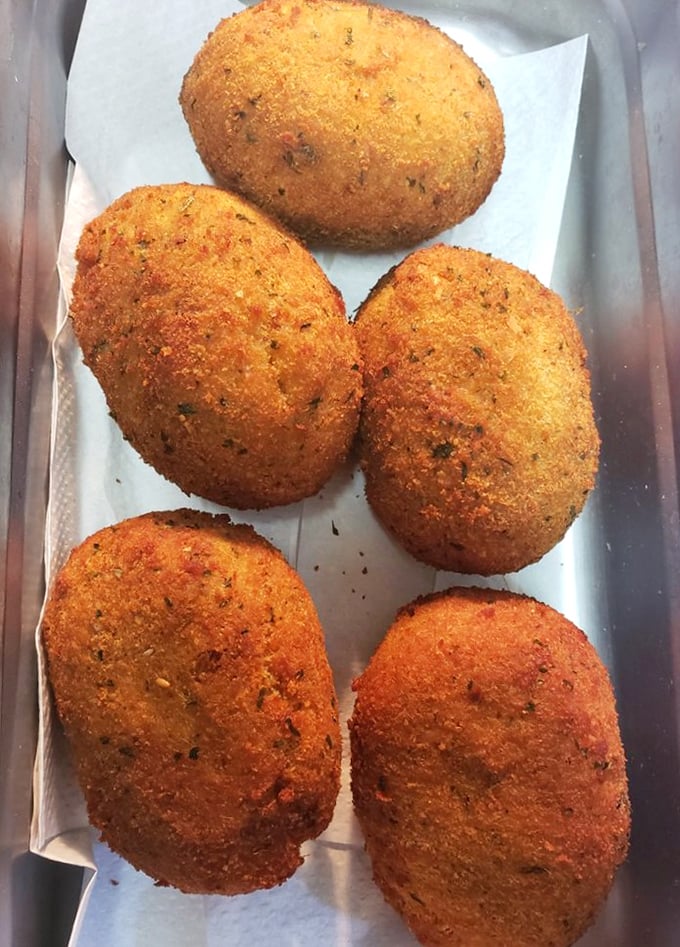 Golden-fried deviled crab cakes that look like they're auditioning for the Seafood Hall of Fame. Crispy exterior, tender interior&mdash;the perfect Florida two-step.