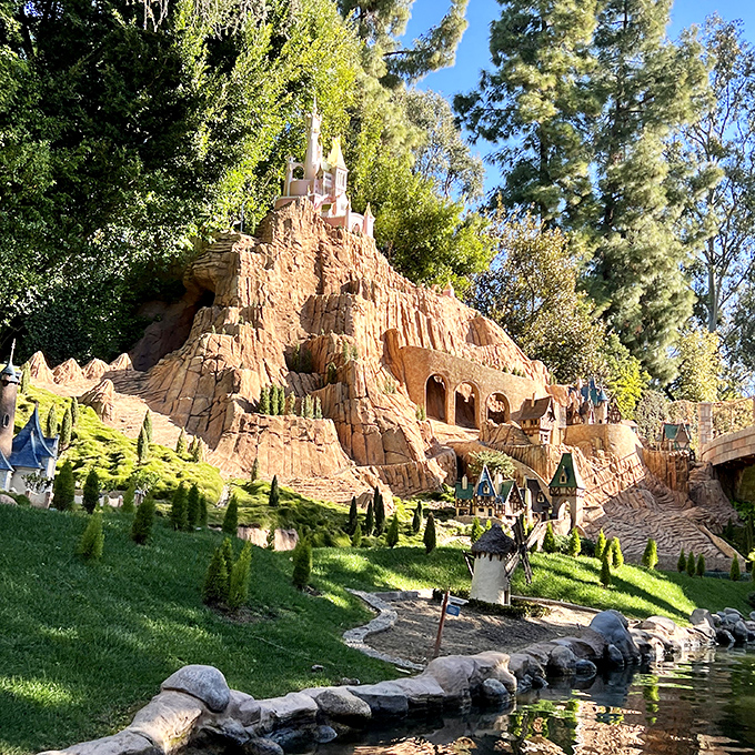 This elaborate miniature castle creation appears to be part of a local garden display, where desert imagination blooms into fantasy landscapes.