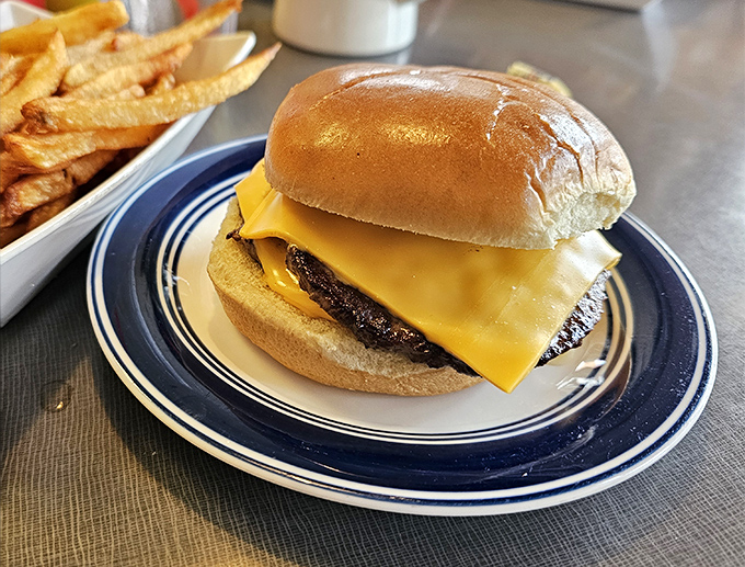 Sometimes perfection is simple: a perfectly grilled patty, melted cheese, and a soft bun. No filters needed for this beauty.
