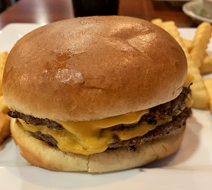 This isn't just a cheeseburger; it's a monument to American ingenuity where beef and cheese achieve perfect harmony. No passport required.