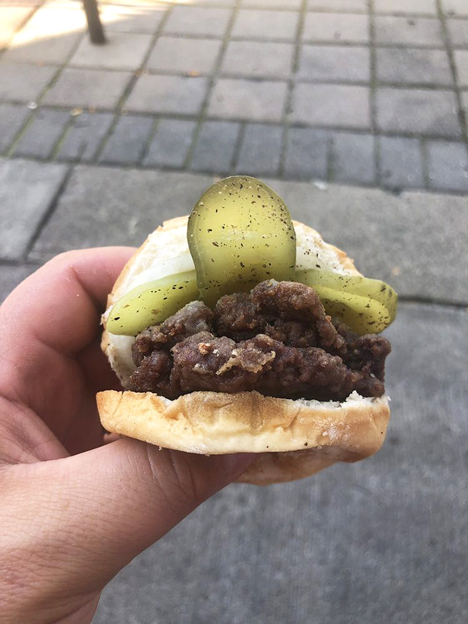 This isn't just a burger, it's edible history. The crispy-edged patty and dill pickle create a flavor combination that's survived two world wars. 