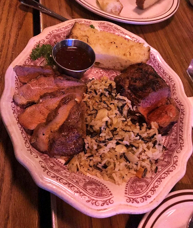 A plate that answers the eternal question: "Why choose between duck and steak when you can have both?" Wild rice that's actually exciting &ndash; not an oxymoron here.