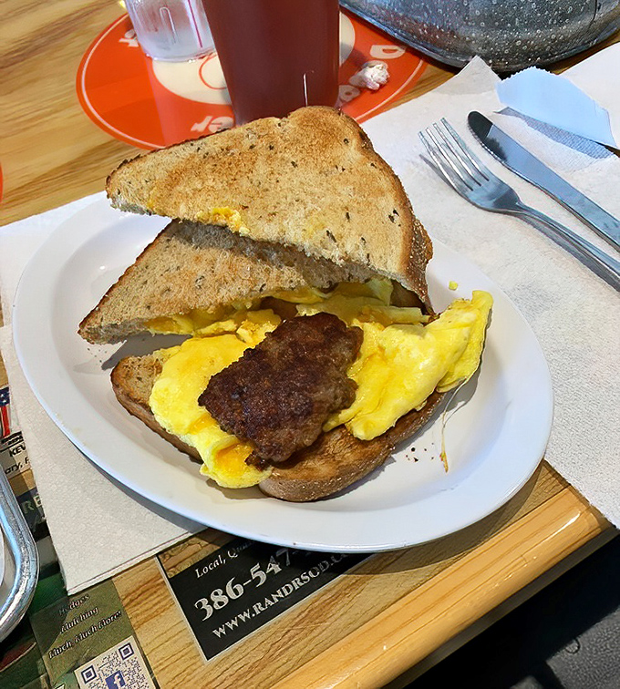 Egg and Sausage Sandwich: Breakfast engineering at its finest&mdash;the humble egg sandwich elevated to an art form where the yolk creates nature's perfect sauce.