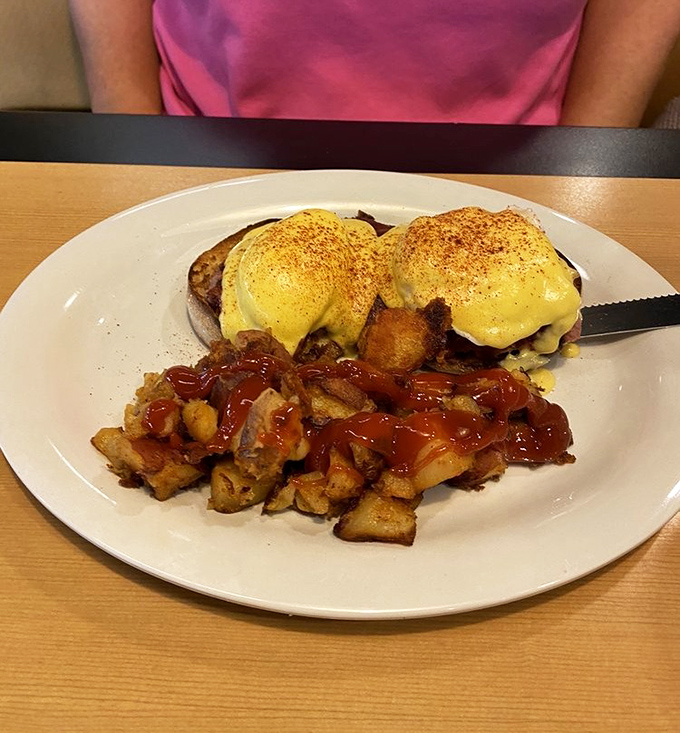 Eggs Benedict done right&mdash;perfectly poached eggs with hollandaise that's silky enough to make a grown person weep with joy. Those home fries look criminally good.