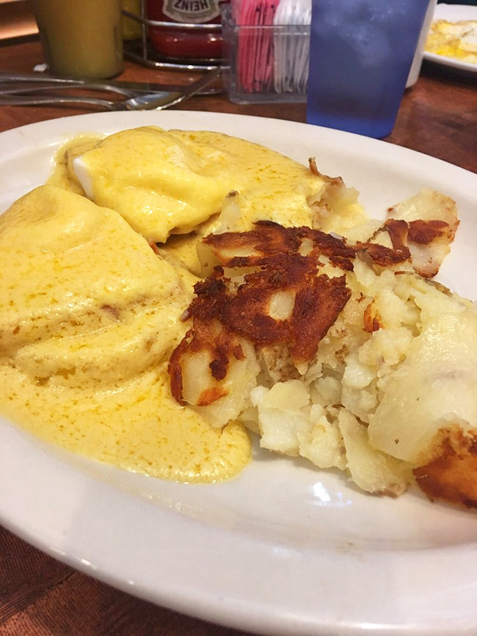 Eggs Benedict done right&mdash;crispy hash browns with that essential griddle char meet hollandaise so sunny it rivals the Arizona morning sky.