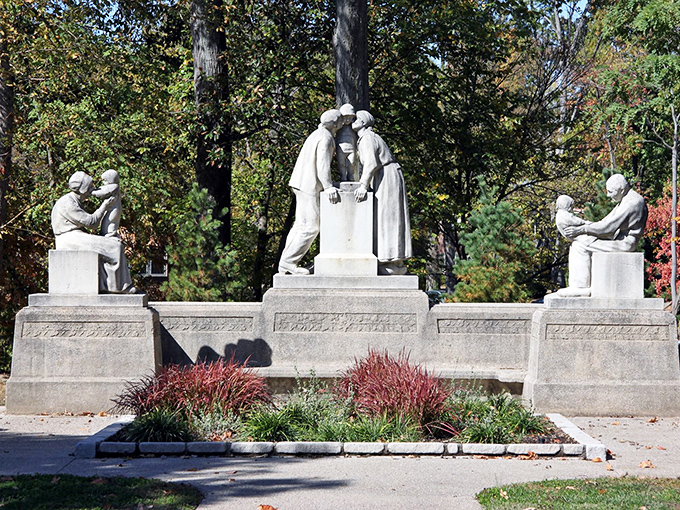 These contemplative stone figures seem to be asking, "Why didn't we bring a picnic?" A timeless question in this picturesque village.