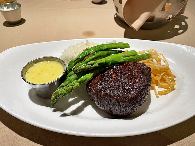 A perfectly seared filet mignon with asparagus spears standing at attention&mdash;this steak doesn't need a passport to transport you somewhere wonderful.