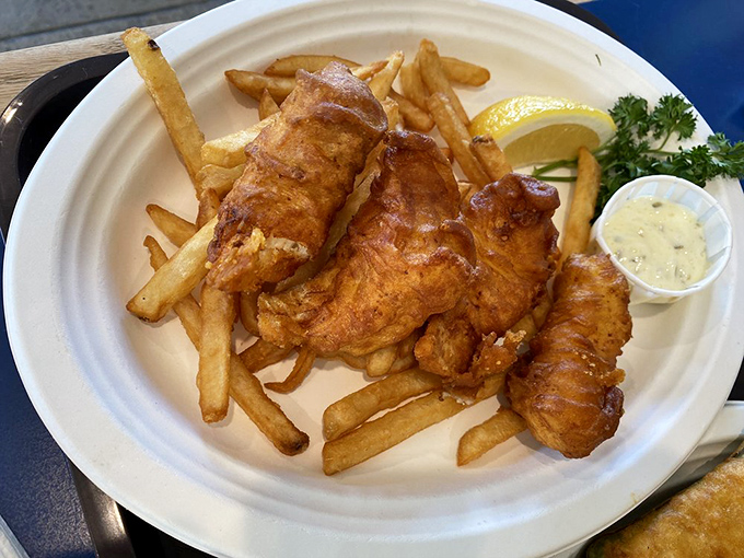 Fish and chips that would make a British pub jealous. Golden-battered perfection with fries that somehow maintain their crispness even as you contemplate a second helping.