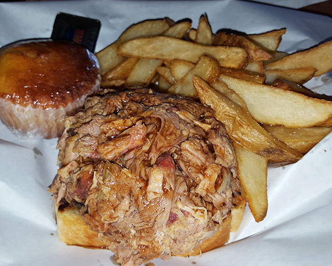 The pulled pork sandwich with hand-cut fries&mdash;a duo that belongs together like Astaire and Rogers. That golden pile of potatoes isn't a side; it's a co-star.