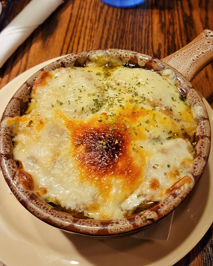 French onion soup that's worth the cheese pull. That caramelized top is the culinary equivalent of a perfect sunset.