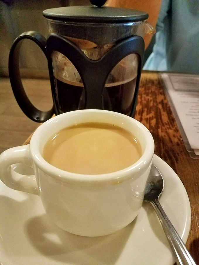 Nothing says civilized breakfast like French press coffee strong enough to wake your inner food critic.