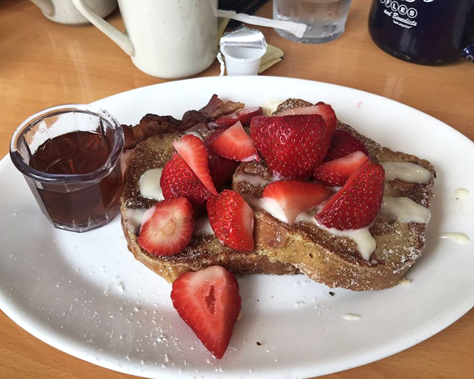 This isn't just French toast&mdash;it's a strawberry-studded island of crispy-edged, custardy bread heaven with maple syrup shores.