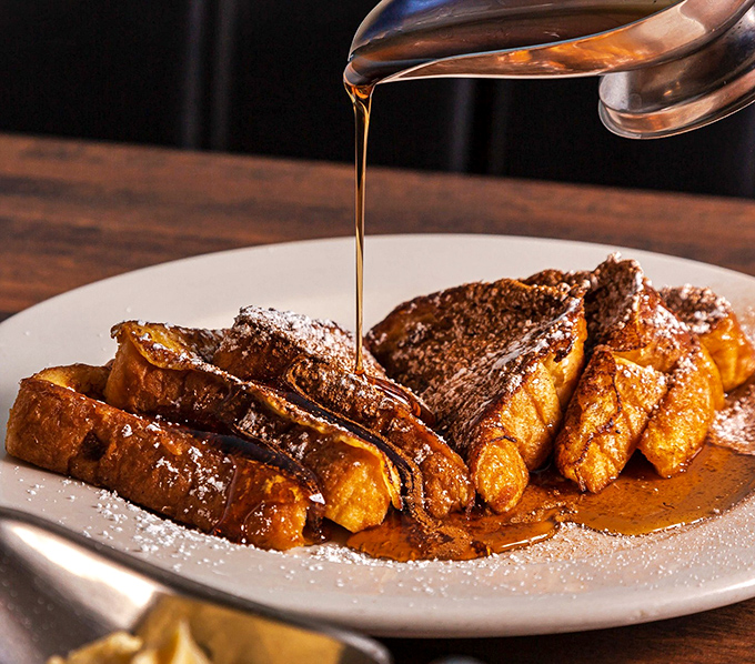 French toast getting the maple syrup waterfall treatment &ndash; a breakfast moment so perfect it deserves its own slow-motion sequence. 