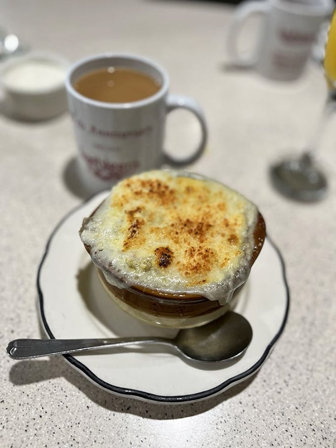 This isn't just French onion soup&mdash;it's a bubbling cauldron of comfort topped with a perfectly broiled cheese cap.