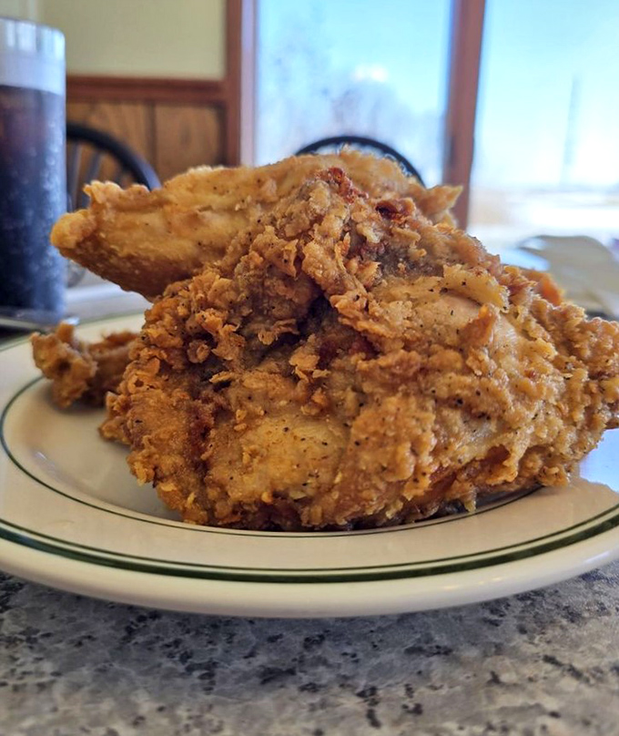 Fried chicken so perfectly golden it deserves its own trophy. That crackling crust is making sounds that shouldn't be legal in public places.