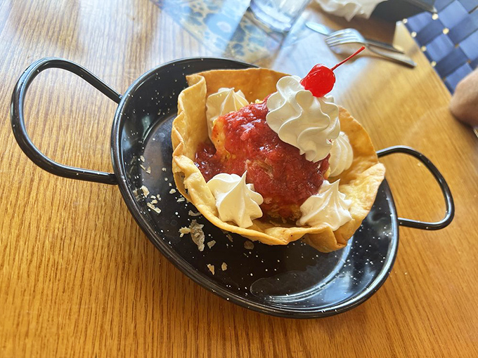 The fried ice cream arrives like a dessert fiesta in a bowl&mdash;crispy tortilla shell, cool sweetness, and whipped cream that makes you question all other desserts.