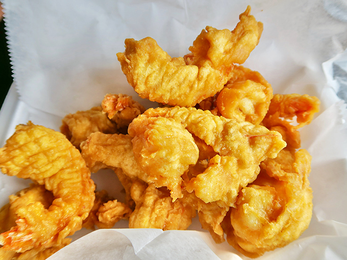 Golden treasures from the fryer. These aren't just any fried shrimp &ndash; they're the reason locals whisper Nunn's name with reverence.