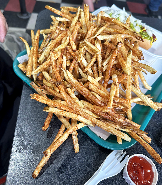 These aren't just fries; they're golden happiness sticks with the perfect crisp-to-fluffy ratio that would make a French chef weep with joy.