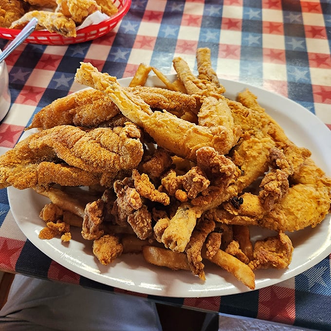 A mountain of golden-fried goodness that could convert even the most dedicated food snob. This platter isn't just a meal&mdash;it's a celebration of Southern frying techniques.