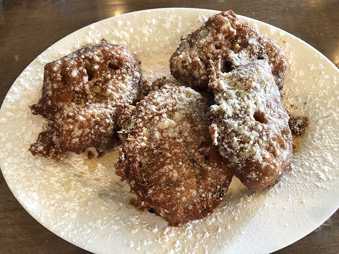 These funnel cake waffles look like they escaped from the county fair and decided to live their best brunch life.