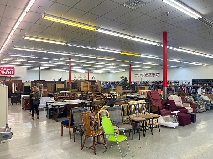 The furniture department resembles a living room museum where mid-century modern mingles with 90s comfort in perfect secondhand harmony.