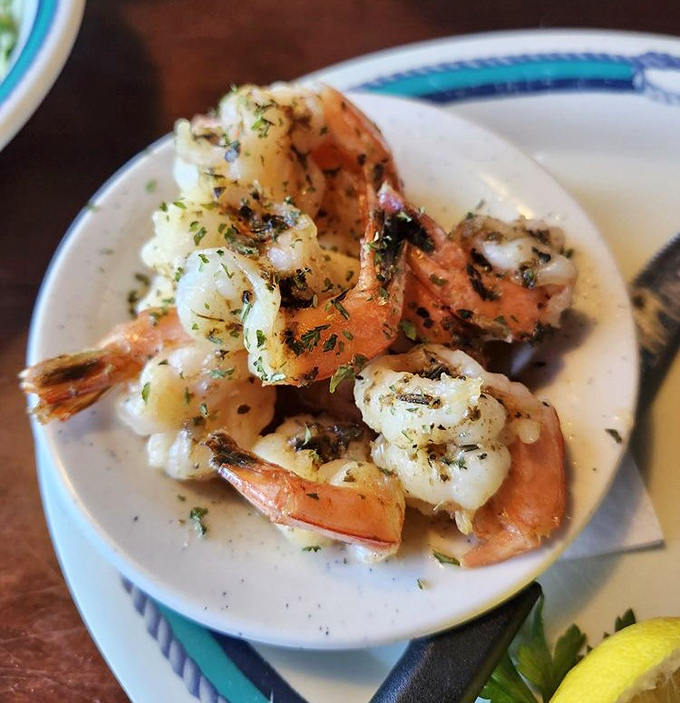 These garlic shrimp aren't just cooked&mdash;they're pampered, bathed in butter and herbs until they practically beg to be devoured.