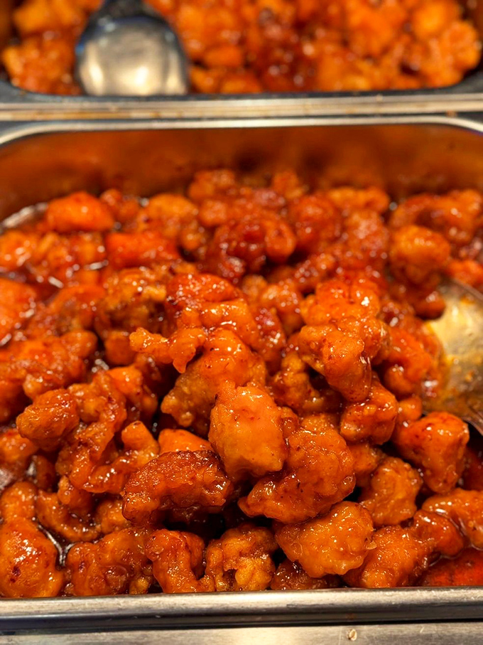 General Tso's chicken glistening with that perfect sweet-spicy glaze&mdash;the dish that's launched a thousand "just one more plate" promises.