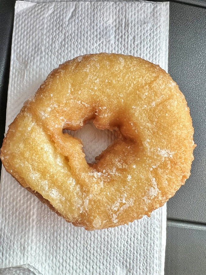 The humble glazed donut&mdash;perfected. That glistening sugar coating shatters just right with each bite, revealing the tender cake beneath.