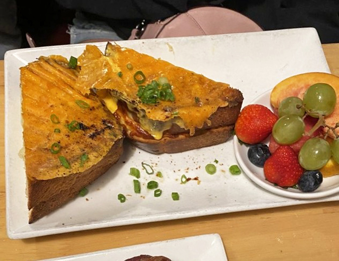 Not your childhood grilled cheese, unless you had an exceptionally talented grandmother. Those melty layers deserve their own Instagram account.