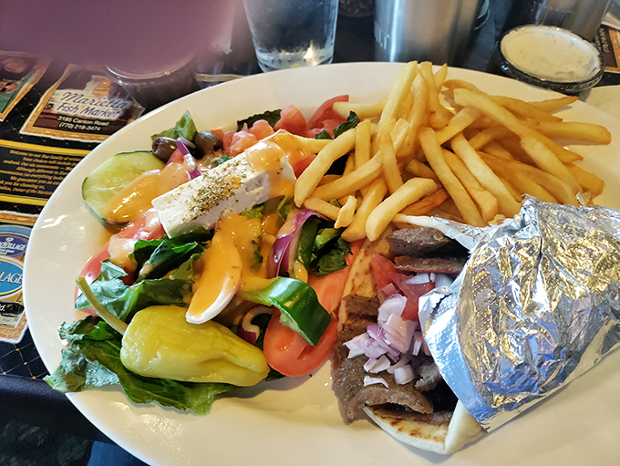 The Greek-Italian fusion nobody asked for but everyone needs. This gyro plate brings Mediterranean sunshine to Georgia's humidity.
