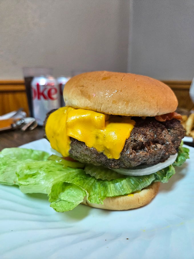 A burger that means business. That melted cheese cascading down the sides isn't just decoration&mdash;it's a promise of deliciousness.