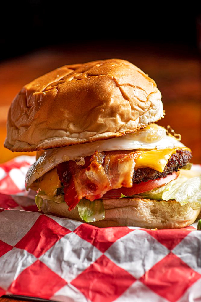 Meet the Hangover Burger &ndash; a towering masterpiece of beef, bacon, and egg that doesn't judge your life choices, just fixes them one bite at a time.
