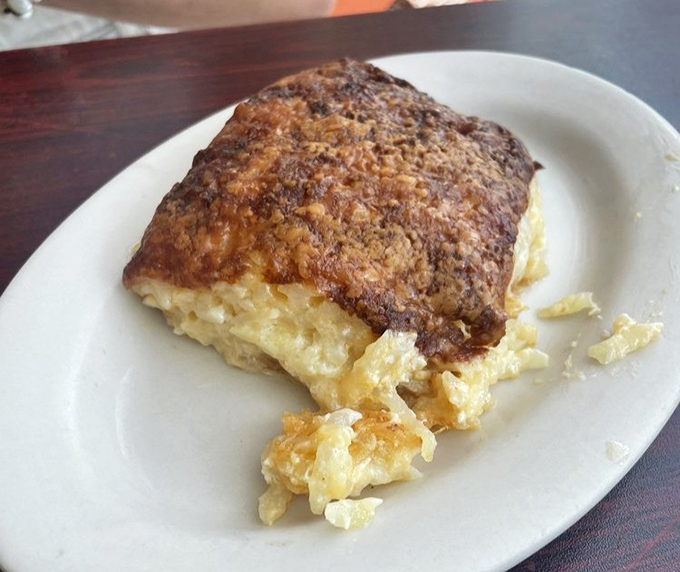 This isn't just an omelet&mdash;it's a fluffy golden monument to morning excellence. The kind of dish that makes you reconsider your relationship with eggs entirely.