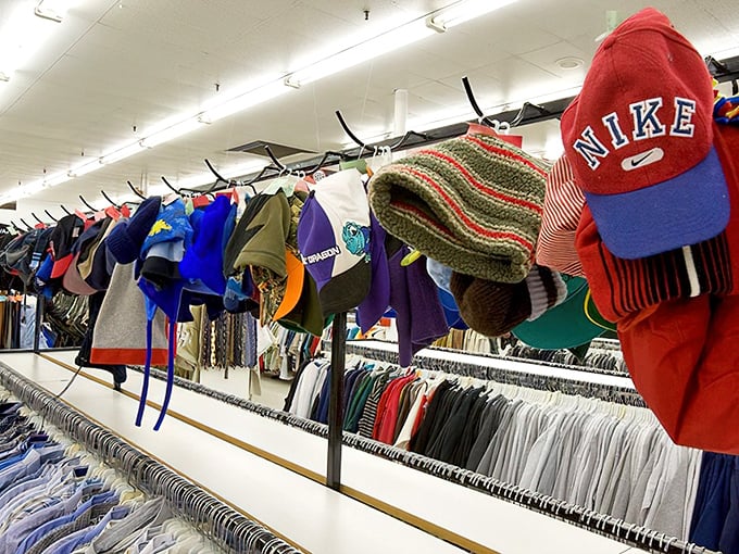 The hat rack at Value World is like a timeline of American fashion history, with everything from vintage beanies to barely-worn Nike caps.