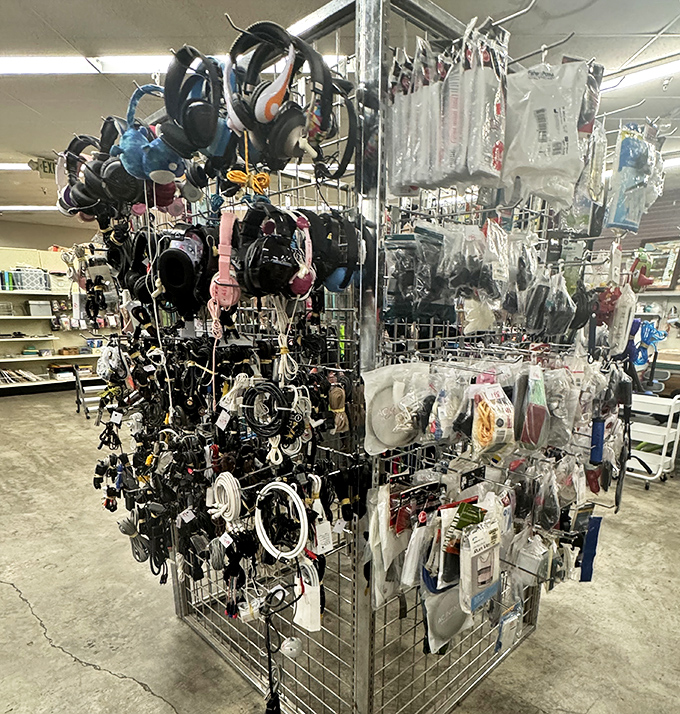 A rotating display of accessories that proves one person's impulse buy is another's treasure hunt victory.